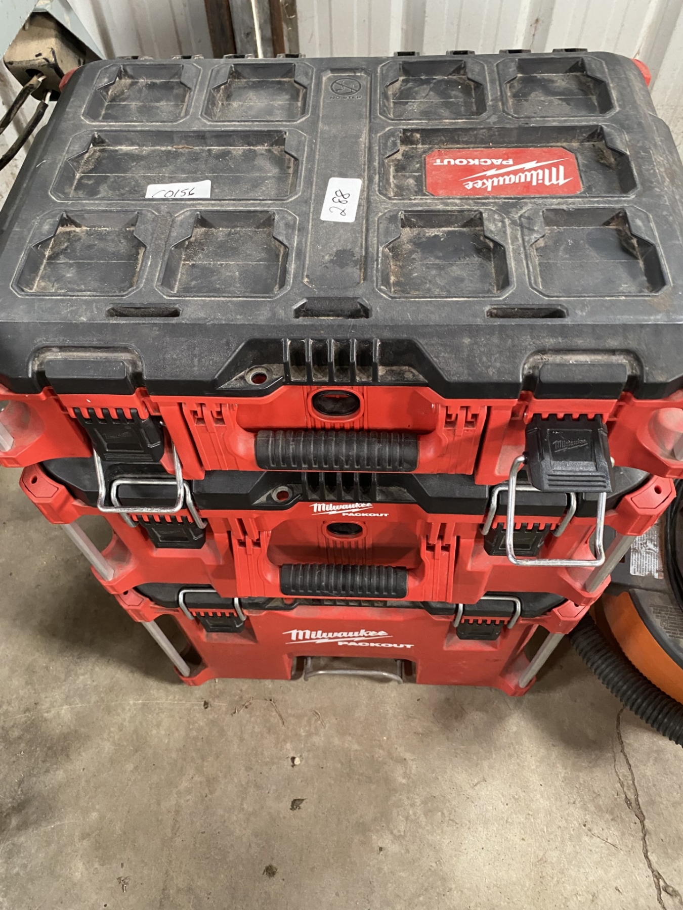 milwaukee packout tool box with misc tools and items