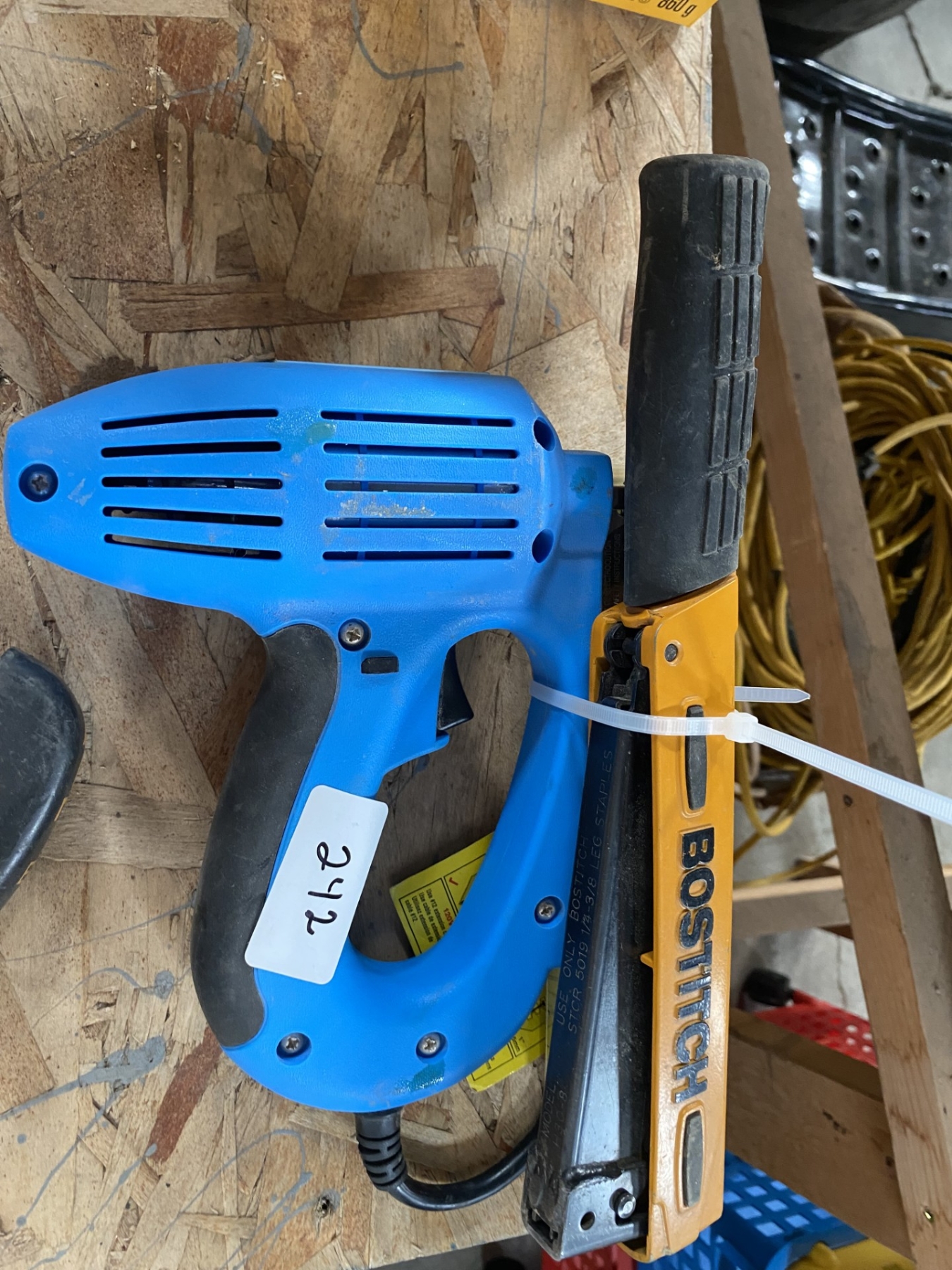 electric staple/nail gun and a hand staple gun